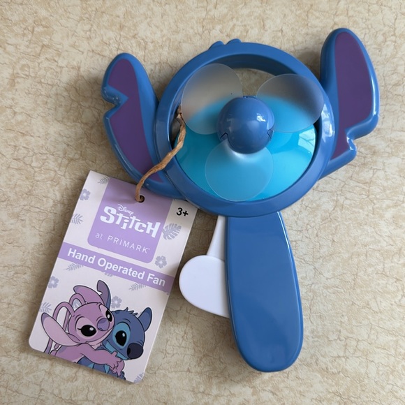 Accessories | Disneys Lilo And Stitch Handheld Hand Operated Fan | Poshmark